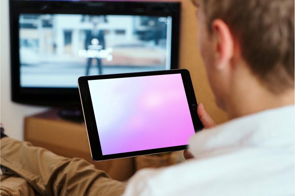 Person Holding iPad Mockup Bundle – MasterBundles