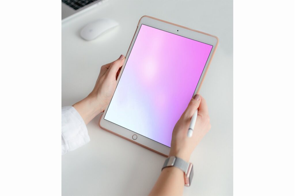 Person Holding iPad Mockup Bundle – MasterBundles
